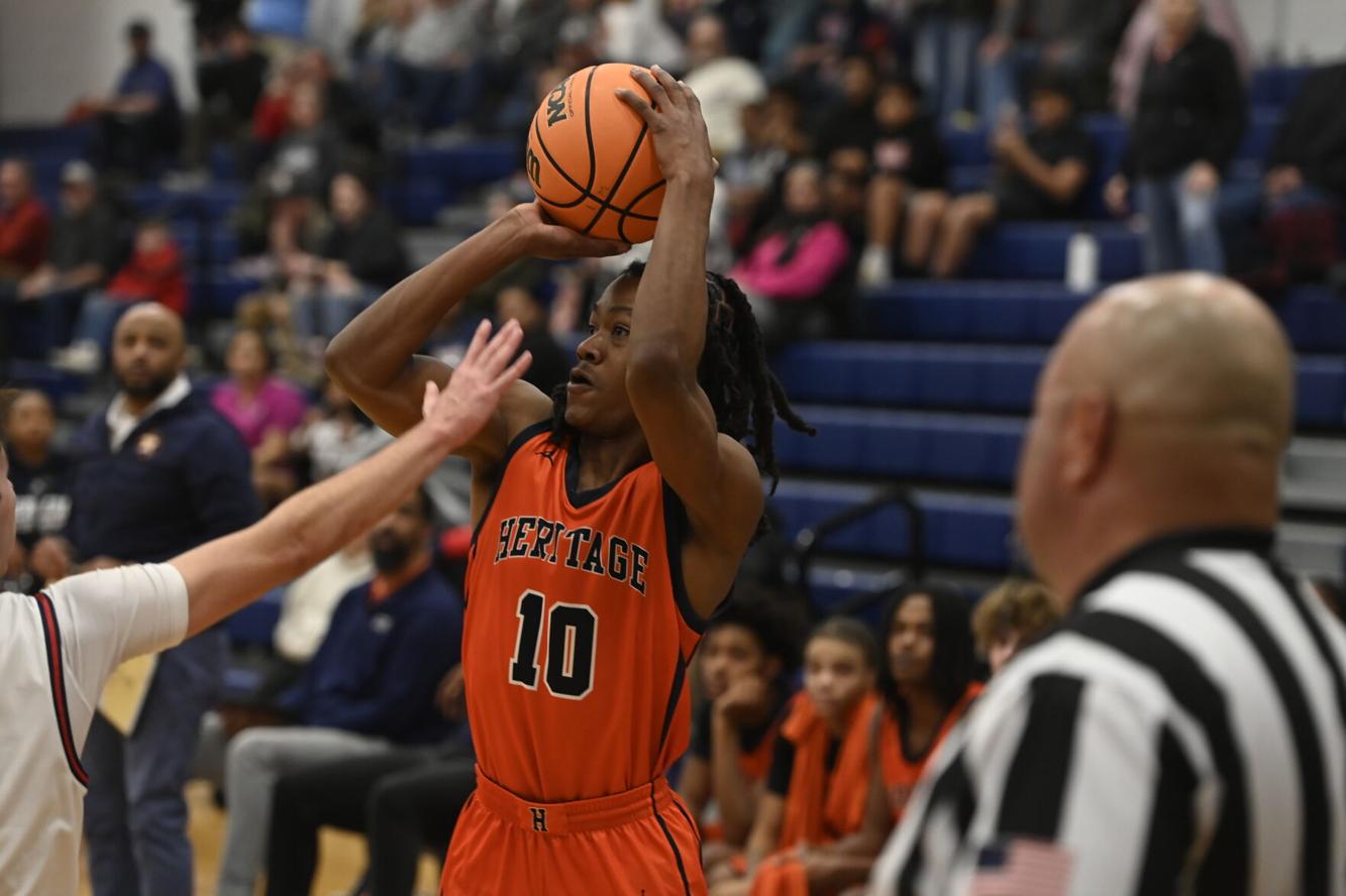 PHOTOS: Liberty High erases double-digit deficit to down Heritage
