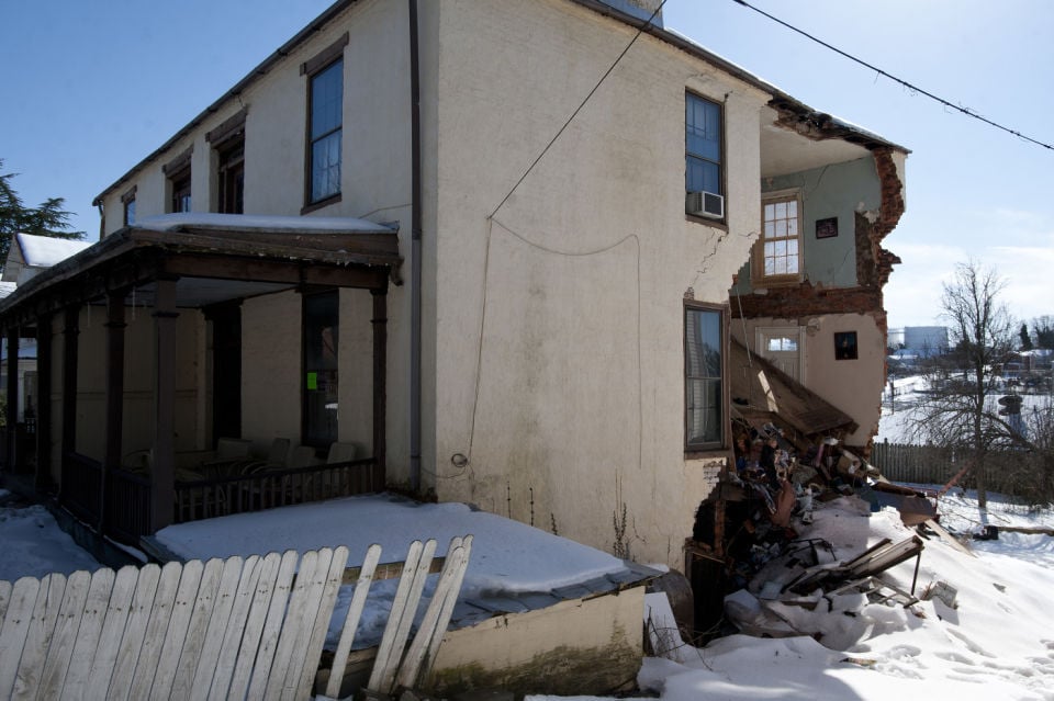 Wall of historic house collapses