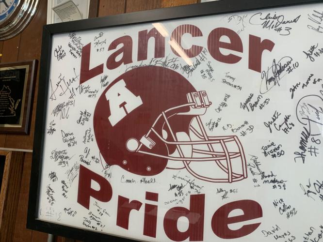 Amherst business owner keeps the pigskins coming at Lancer home ...