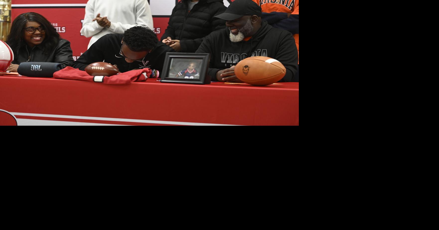 Rustburg's Alex Dunn inks football commitment to Virginia