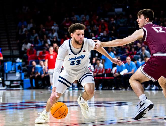 New Mexico State indefinitely suspends player who punched Liberty’s ...