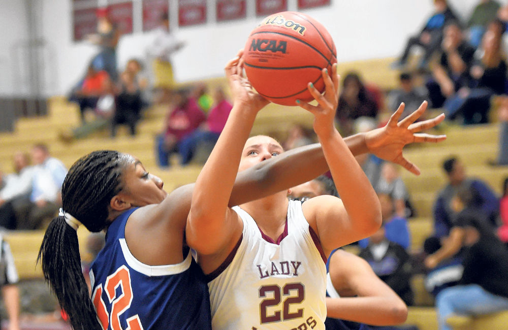 Lady Lancers rout Heritage to even their record