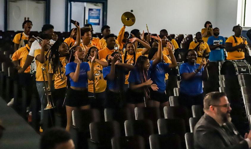 National Pawn gives gift of music to Goldsboro marching band | Local ...