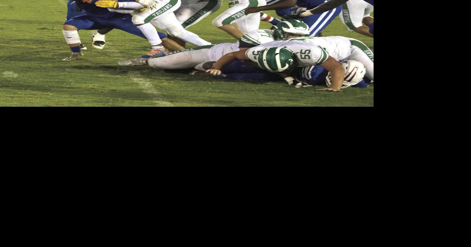 Whiteville lands more haymakers to win offense fight with Trojans, 64 ...