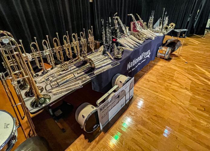 National Pawn gives gift of music to Goldsboro marching band | Local ...
