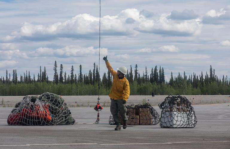 Crews at Northway Helibase make effort to fight back Boundary River ...