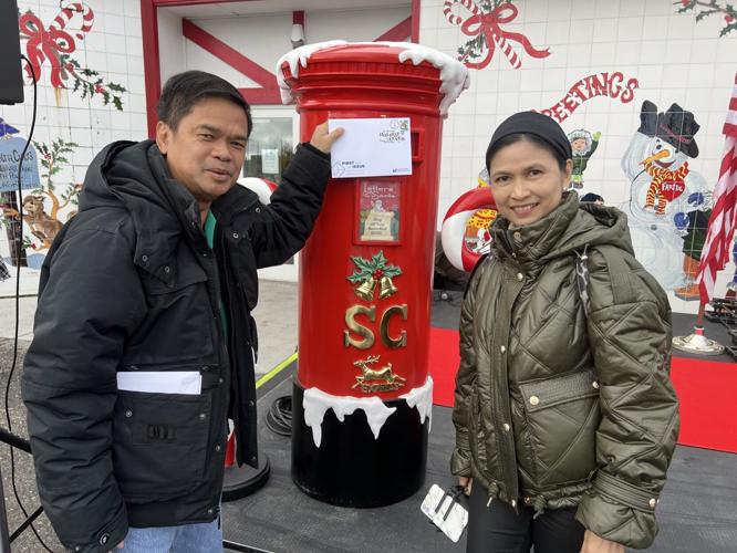 Holiday Elves Forever Stamps debut at Santa Claus House | Kris Capps ...