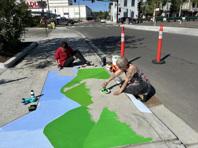 Artists paint downtown storm drains | Local News | newsminer.com