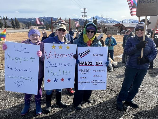 Colorful flags, penguins and protest signs fill Healy in 'Hands Off ...
