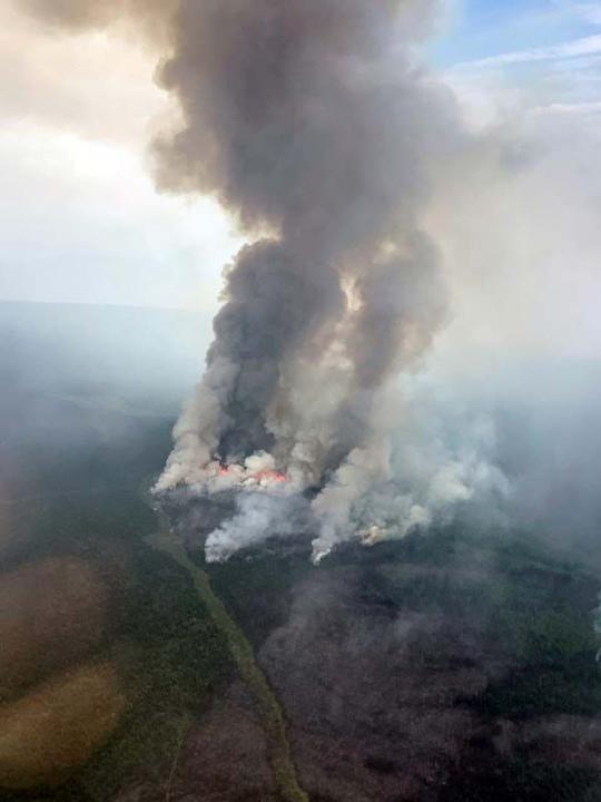 Interior wildfires moderated but still burning after precipitation ...