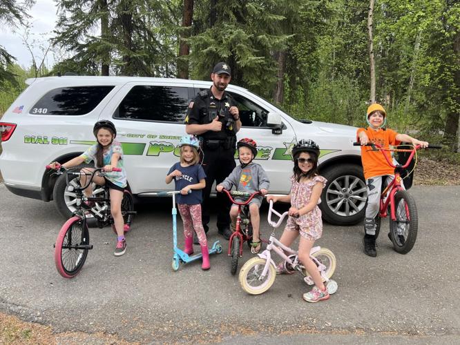 North Pole police promote bicycle safety with free ice cream cones ...