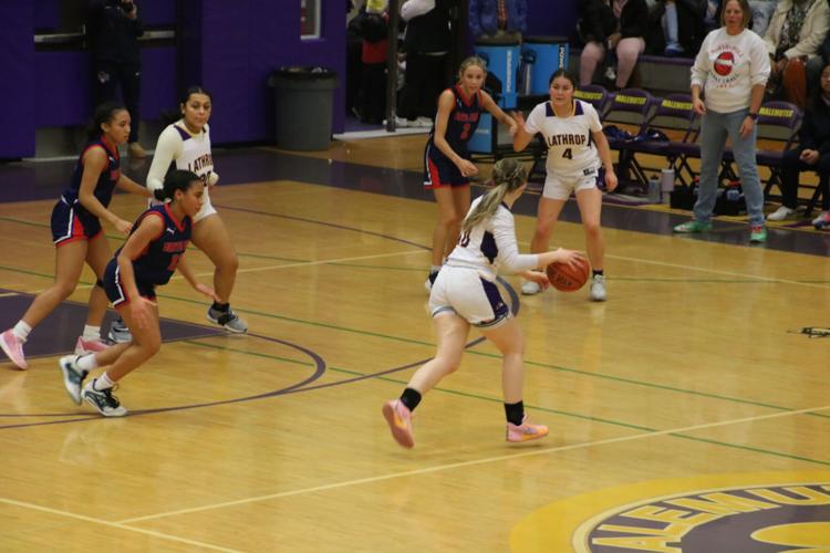 Lathrop hosts North Pole for 12th annual Silent Night basketball games ...