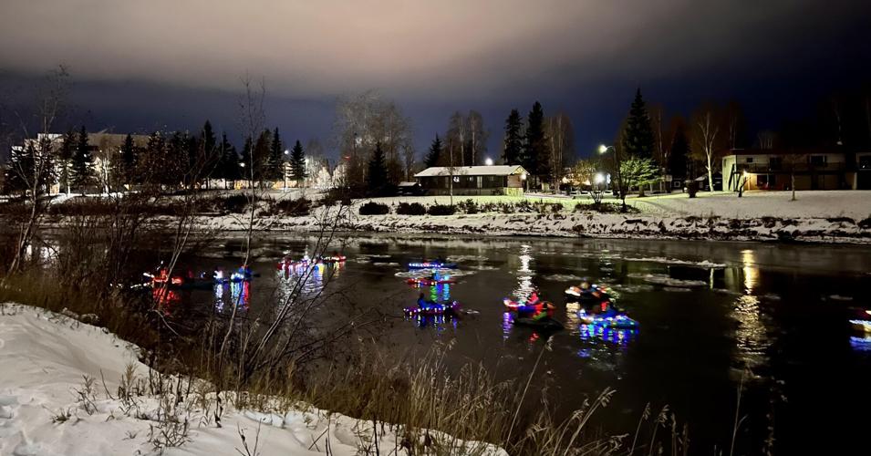 Paddlers celebrate change of season with glow float | Kris Capps ...
