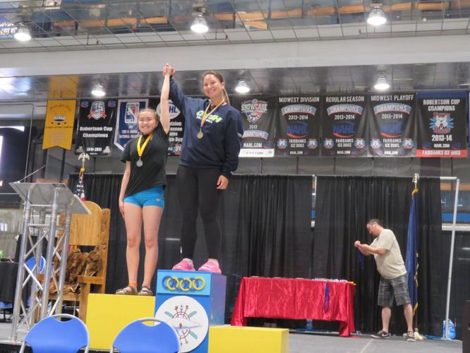 Greased pole walk takes place during day two of WEIO games | Local ...