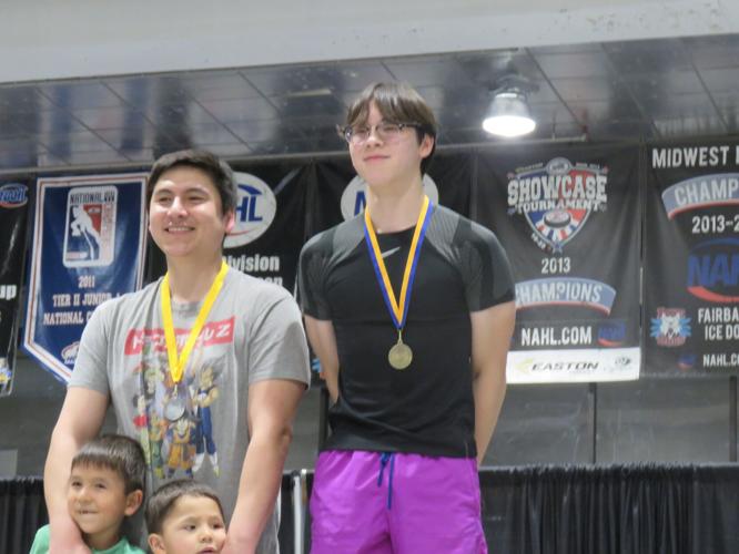 Greased pole walk takes place during day two of WEIO games | Local ...