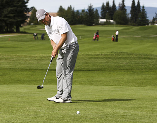 Adam Baxter takes second-round lead in State Amateur Championship ...