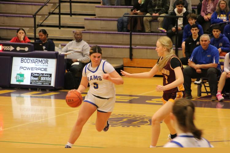 Monroe basketball teams split games at opening night of Joe T. Classic ...