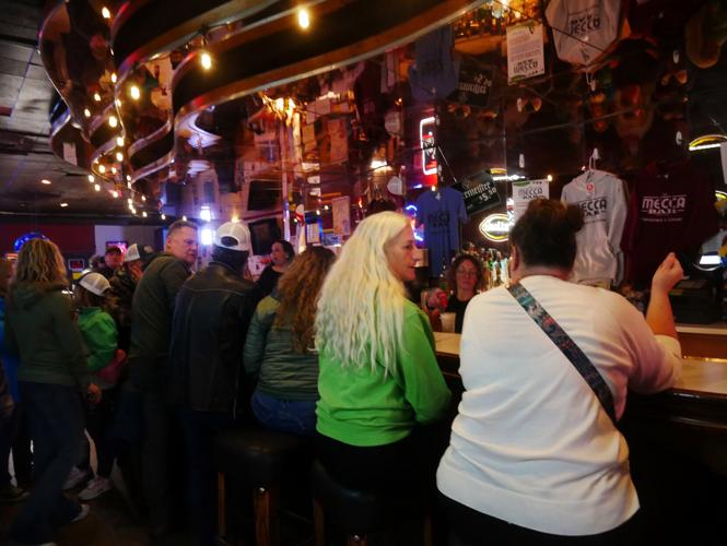 A large gathering cheers to Mecca Bar's support | Local News ...