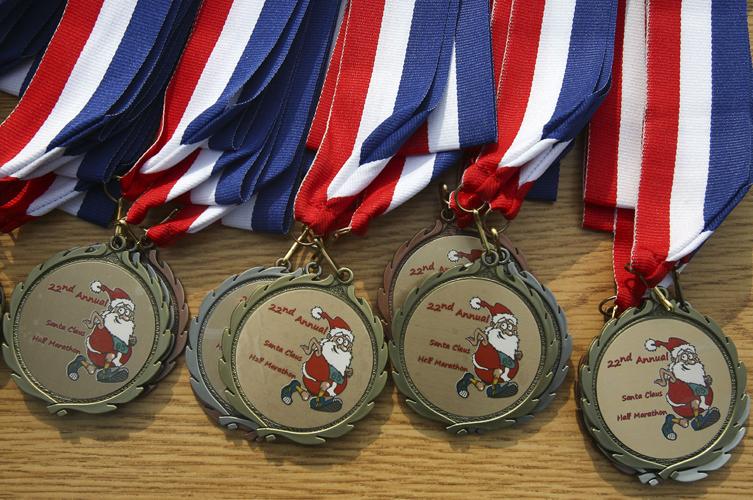 Matthew Daugherty, Davya Flaharty capture titles in Santa Claus Half ...