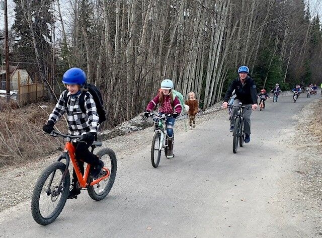 Woodriver students bike to school en masse as part of a healthy ...