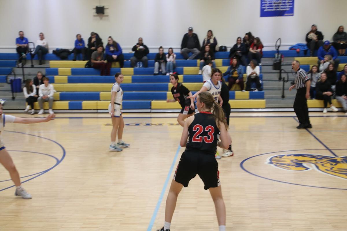 Monroe Catholic girls score 90 points in season-opening win over ...
