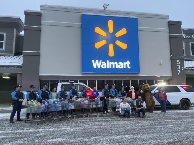 Alaska State Troopers shop for kids at Walmart | Kris Capps | newsminer.com
