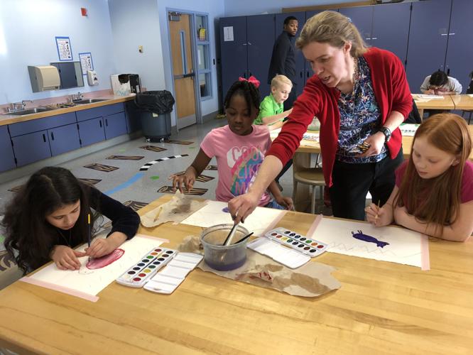 Artist in residence teaches children about color theory and painting ...