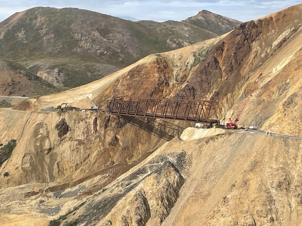 Engineers 'launch' first portion of bridge at Polychrome Pass ...