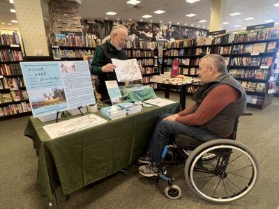 Ray Bonnell signs his newest book | Latitude 65 | newsminer.com