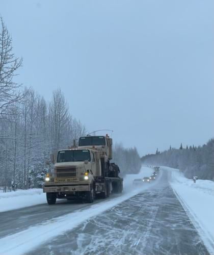 Military vehicle flips on black ice on the Richardson Highway ...