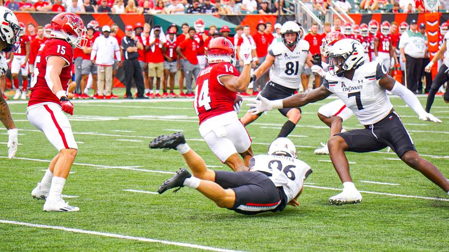 PHOTOS | Bearcats victorious over Miami University 38-17 in Battle for ...