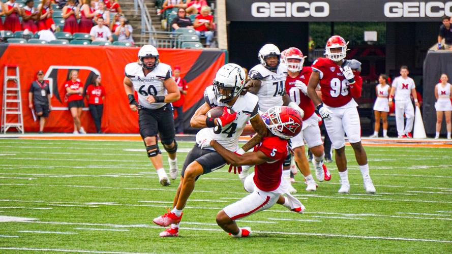 PHOTOS | Bearcats victorious over Miami University 38-17 in Battle for ...