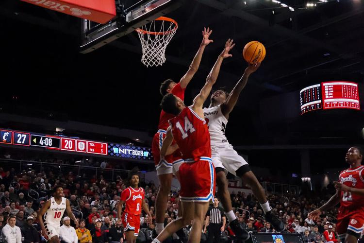 PHOTOS | UC men's basketball advances in NIT with win against Bradley ...