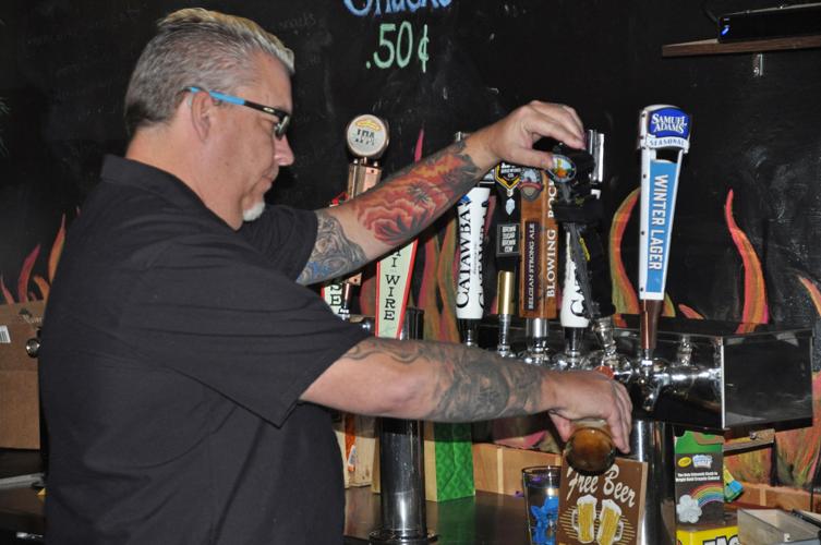 Bottle shop owners aim to help build community | Local News ...