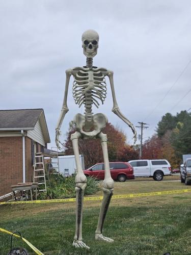 Pennell Street family displays 12-foot-tall skeleton for Halloween ...