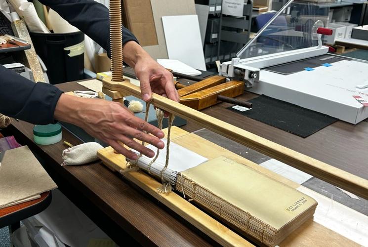 UCF’s book conservator preserves history one page at a time | Life ...