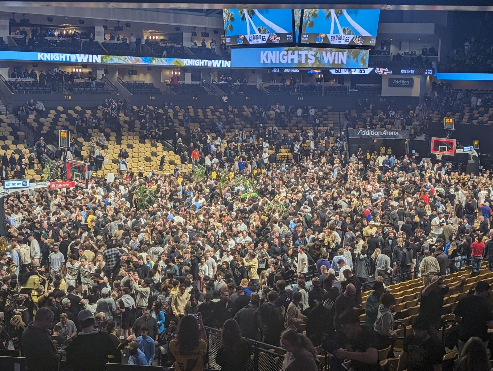 Fans storm the court as UCF men's basketball upsets No. 3 Kansas ...