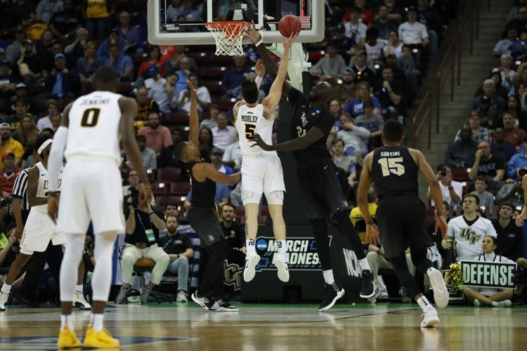 Photos: UCF men's basketball scores first NCAA Tournament win in ...
