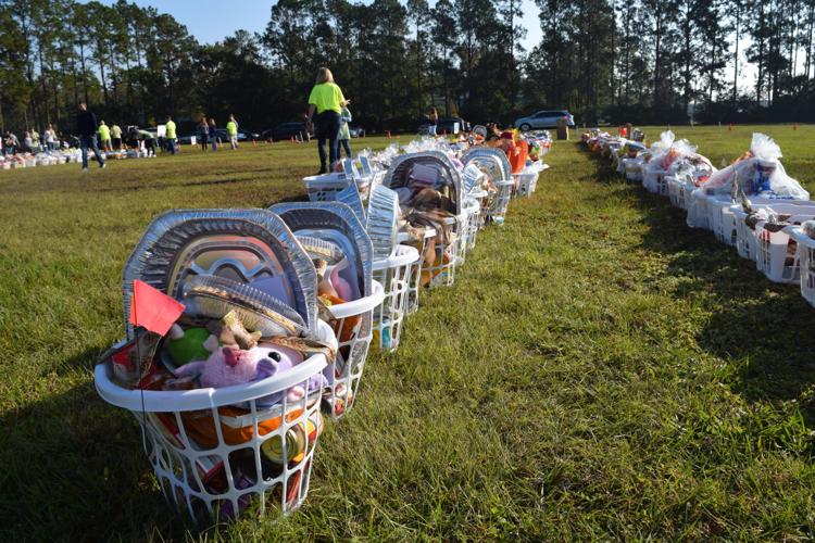 Photos: Basket Brigade Central Florida bundles Thanksgiving meals ...