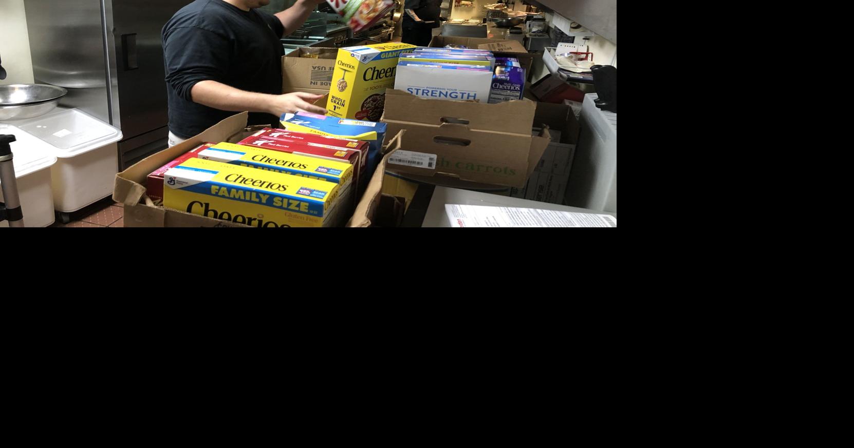 Local UCF bar donates food packages to families in need as schools ...