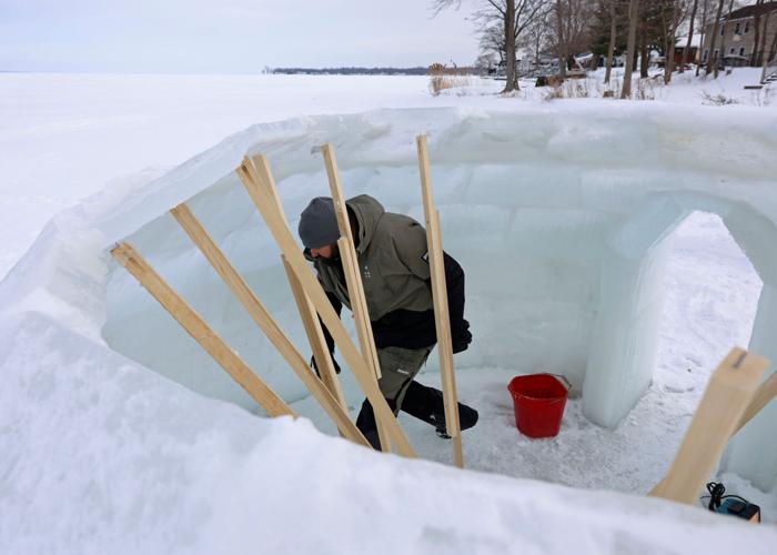 Central New York couple builds 8,000-pound igloo on Oneida Lake ...