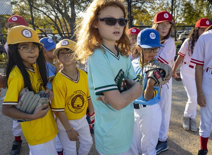 An all-girls baseball league aspires to keep girls in the male ...