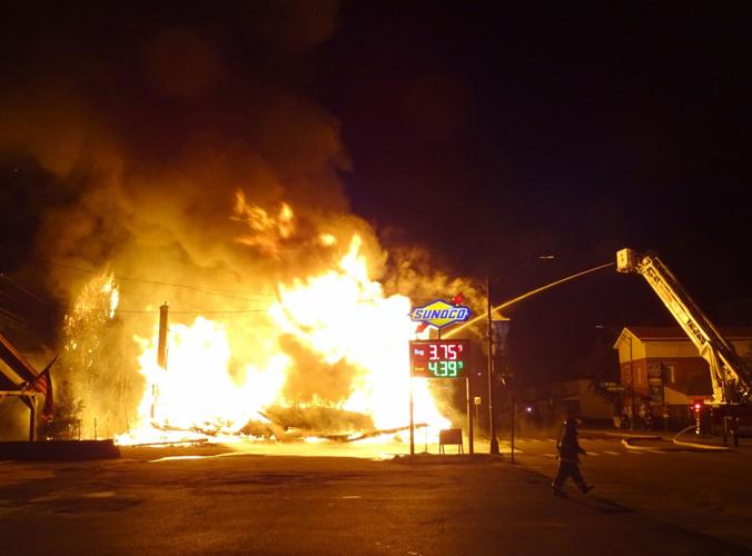 PHOTOS: Fire destroys building on Main Street in Tupper Lake | Police ...
