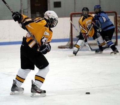 Natalie Giglio of Canton sends a shot toward goal during a scrimmage ...