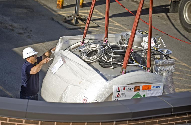 Crane helps install 7-ton MRI machine via Samaritan roof | News ...
