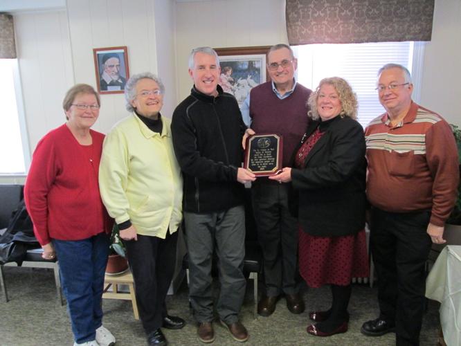 Group presents plaque to Alcoa | News | nny360.com