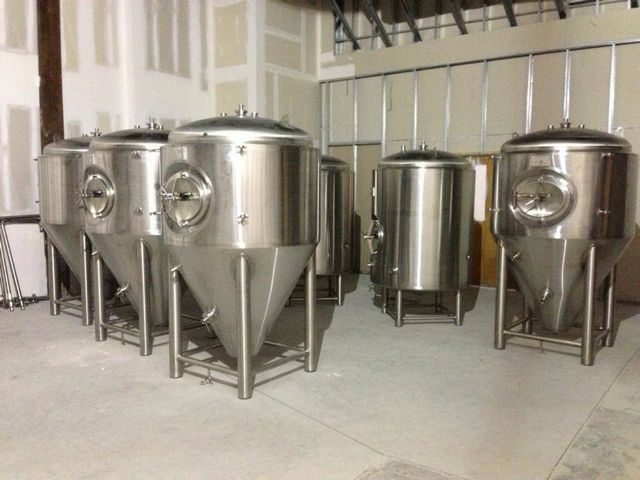 Fermentation tanks arrive for brew pub skewed brewing: Construction ...