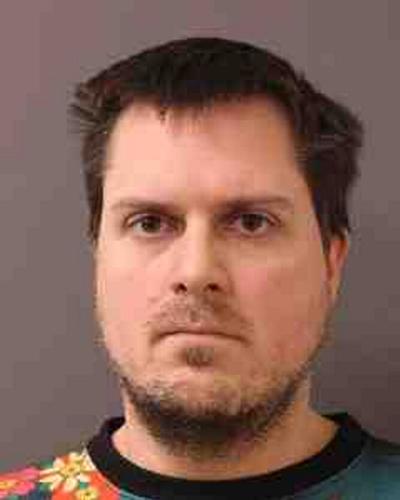 Watertown man arrested after allegedly setting fire to pile of garbage ...