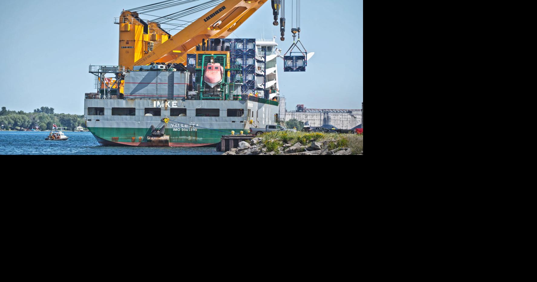 PHOTOS: Four days after running aground, cargo ship begins unloading at ...