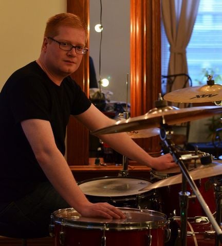 A different drummer Newsman Jeff Nelson keeps the beat for band Merit ...